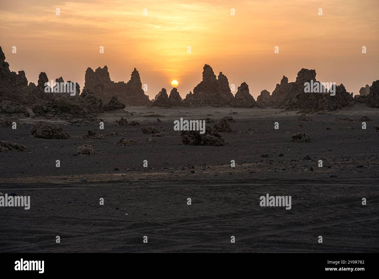 Sunrise around the volcanic chimneys of Lake Abbe (Lac Abbe Bad ...