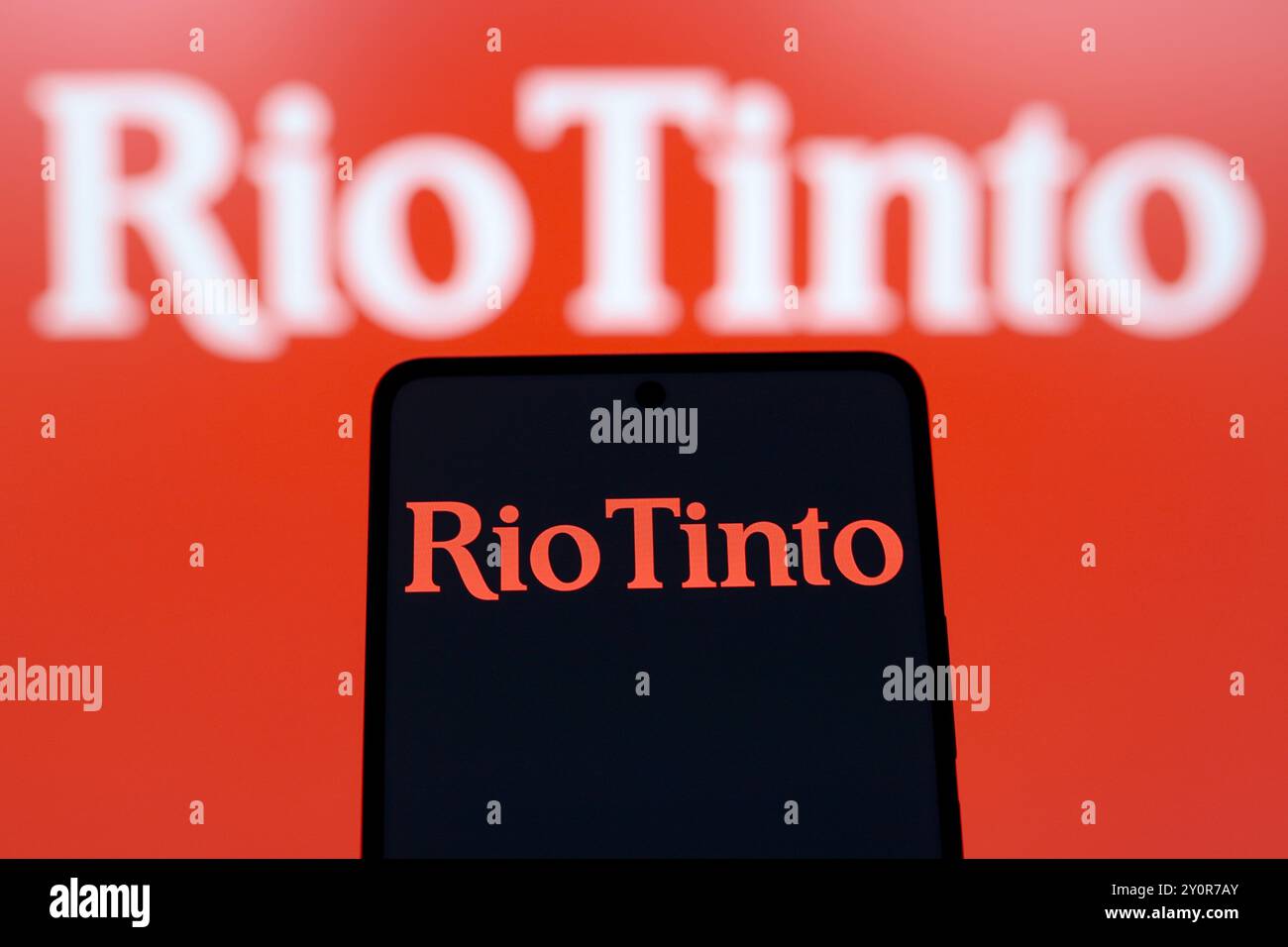 In this photo illustration, the Rio Tinto logo is displayed on a ...