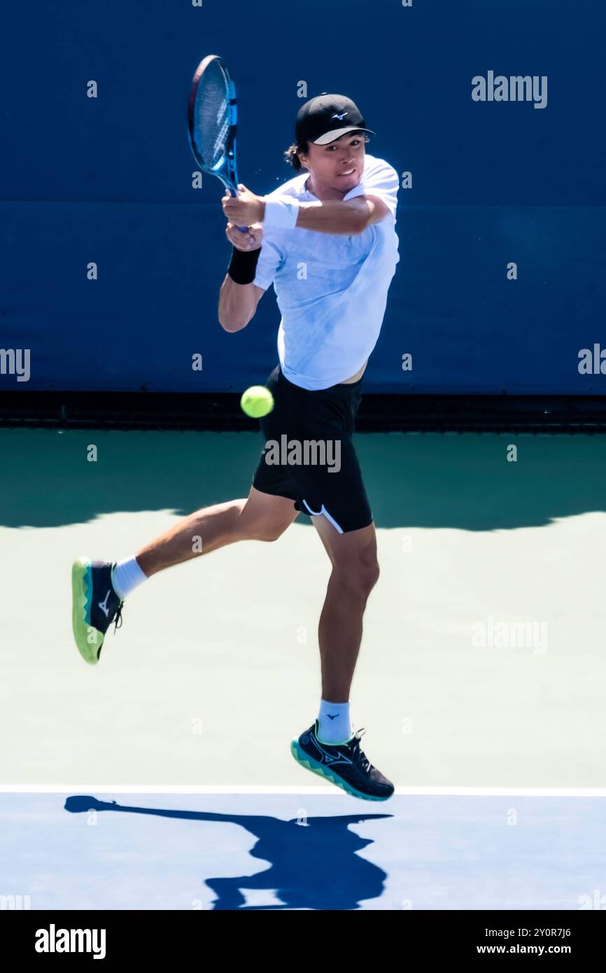 Taro Daniel (JPN) competes in round 1 of the 2024 US Open Tennis Stock ...