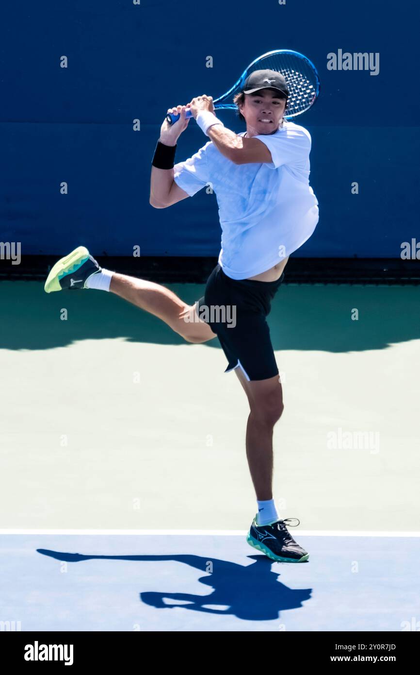 Taro Daniel (JPN) competes in round 1 of the 2024 US Open Tennis Stock ...