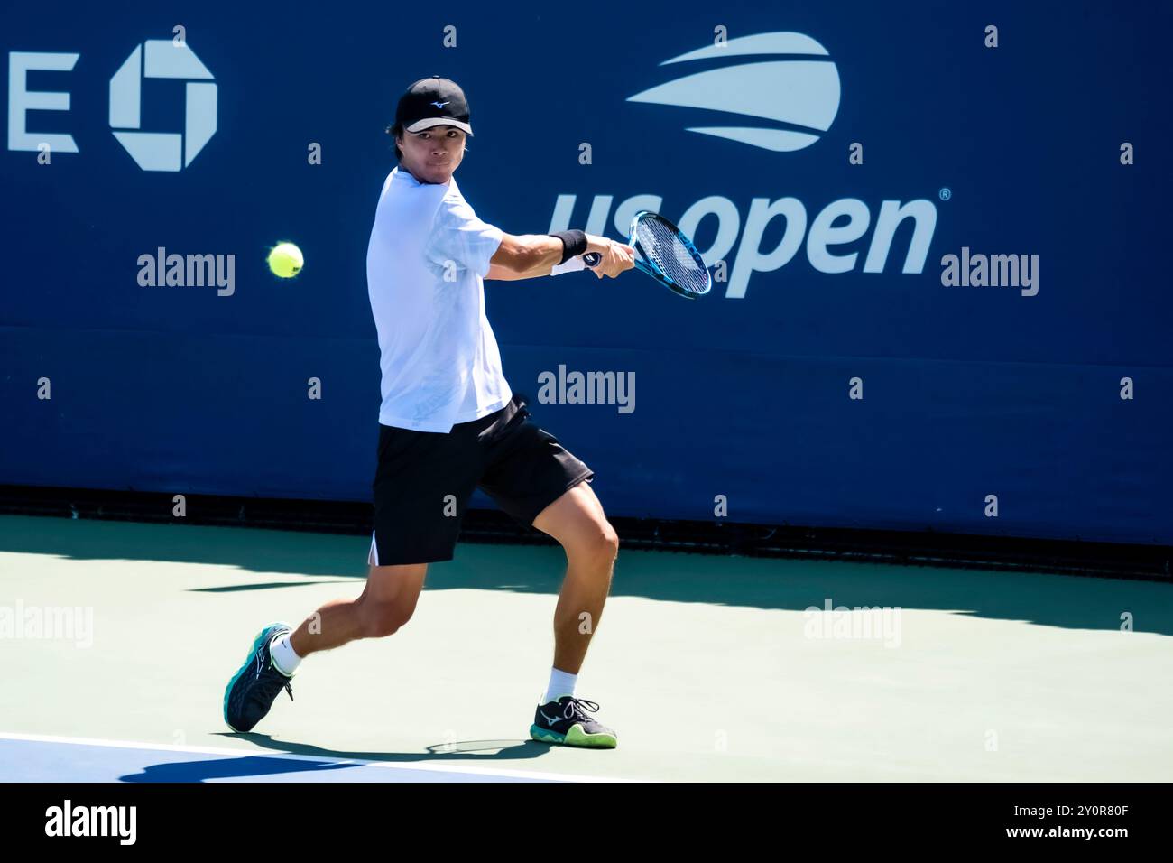Taro Daniel (JPN) competes in round 1 of the 2024 US Open Tennis Stock ...