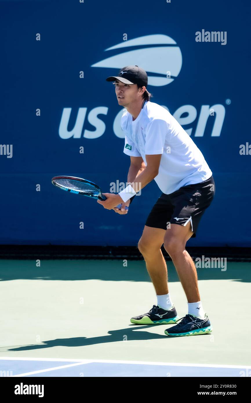 Taro Daniel (JPN) competes in round 1 of the 2024 US Open Tennis Stock ...