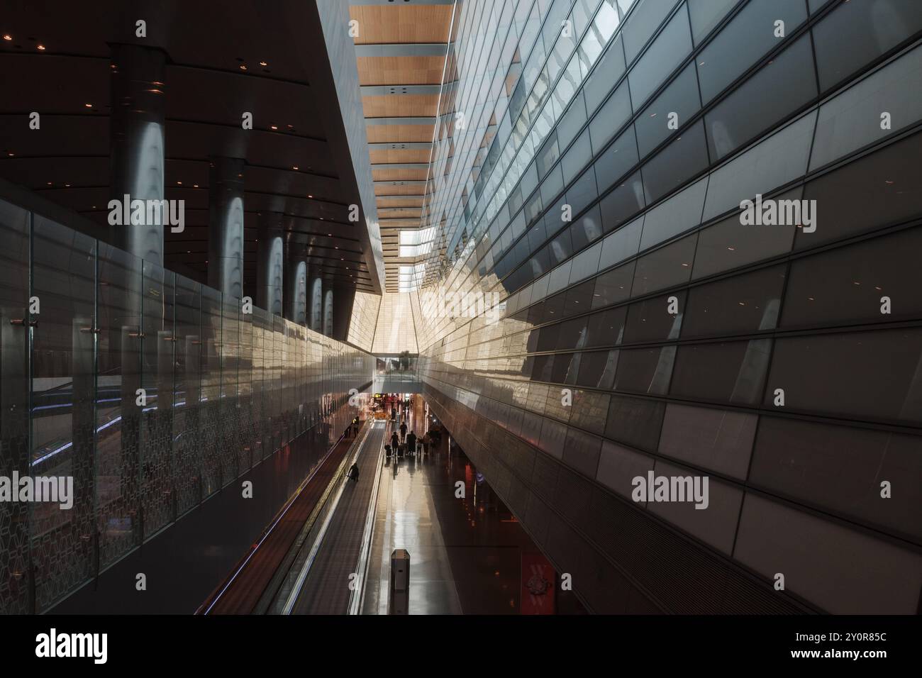 Doha, Qatar - 29 August 2024: Interior view a spacious airport terminal ...