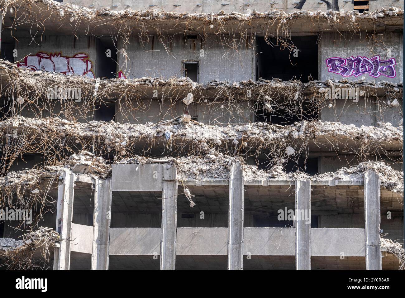 Demolition of a former office building, after complete gutting only the ...
