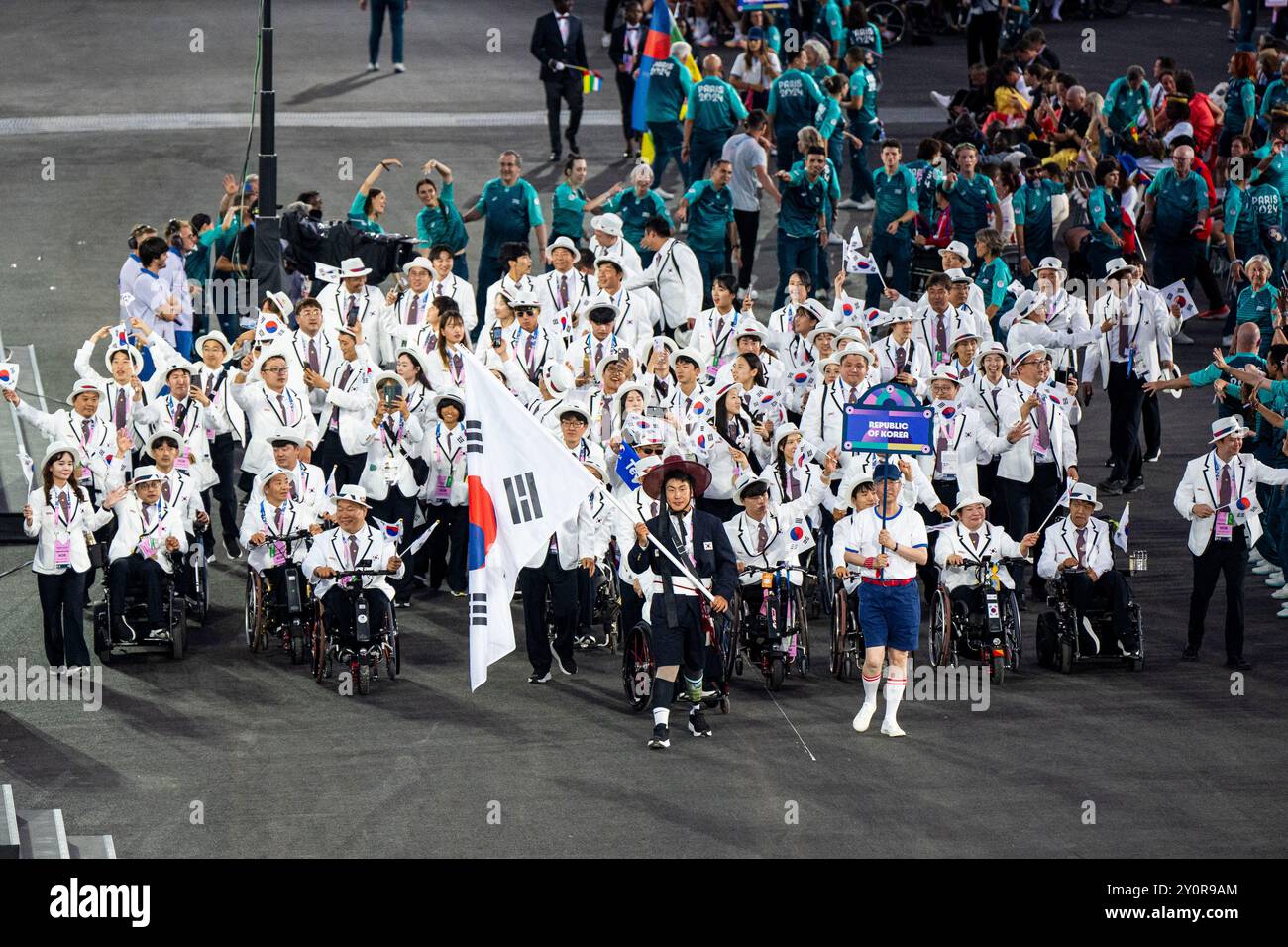 The Cores delegation, with YONG BEOM CHOI, para canoeing as flag bearer ...