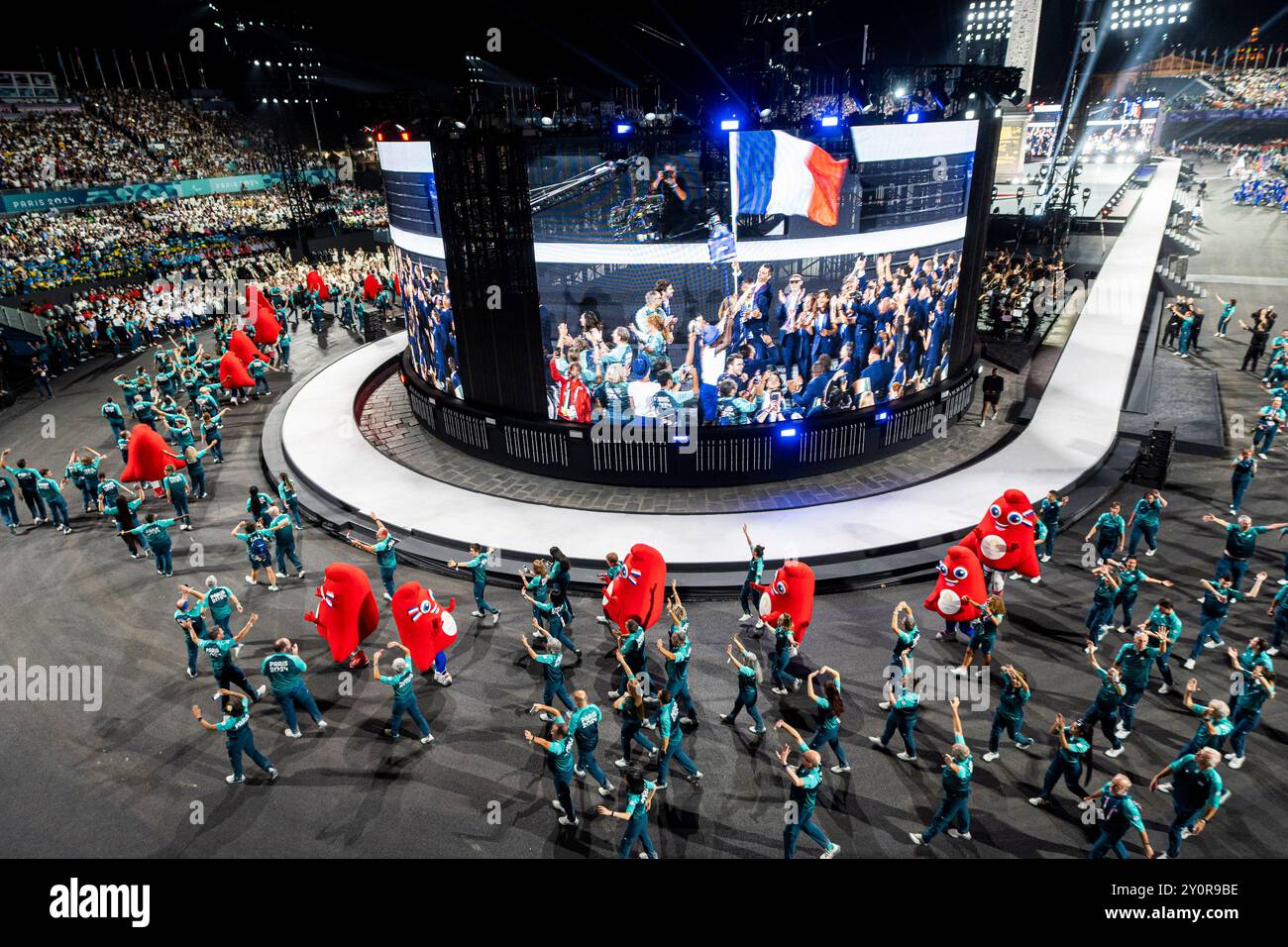 Dolls of PHRYGE, the Paris 2024 mascot, and hundreds of volunteers ...