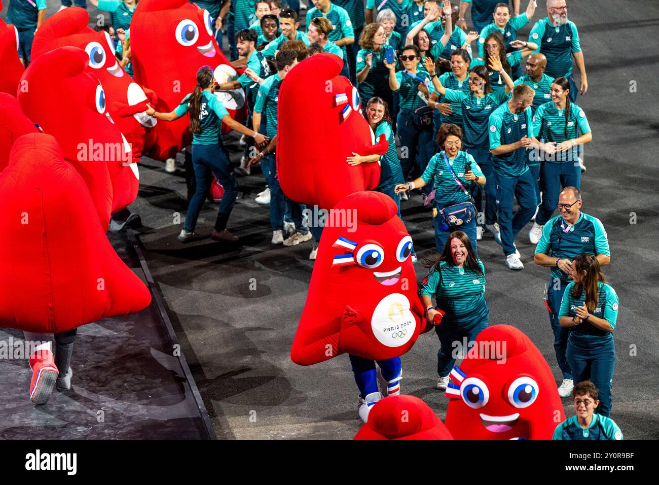 Dolls of PHRYGE, the Paris 2024 mascot, and hundreds of volunteers ...