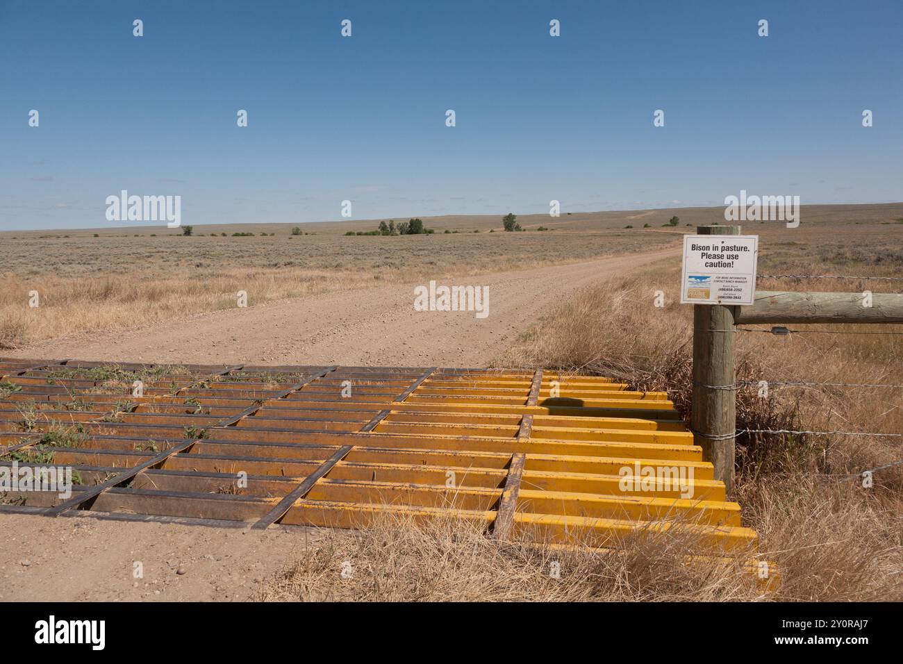 Sing showing changing land use: "Bison in pasture. Please use caution ...