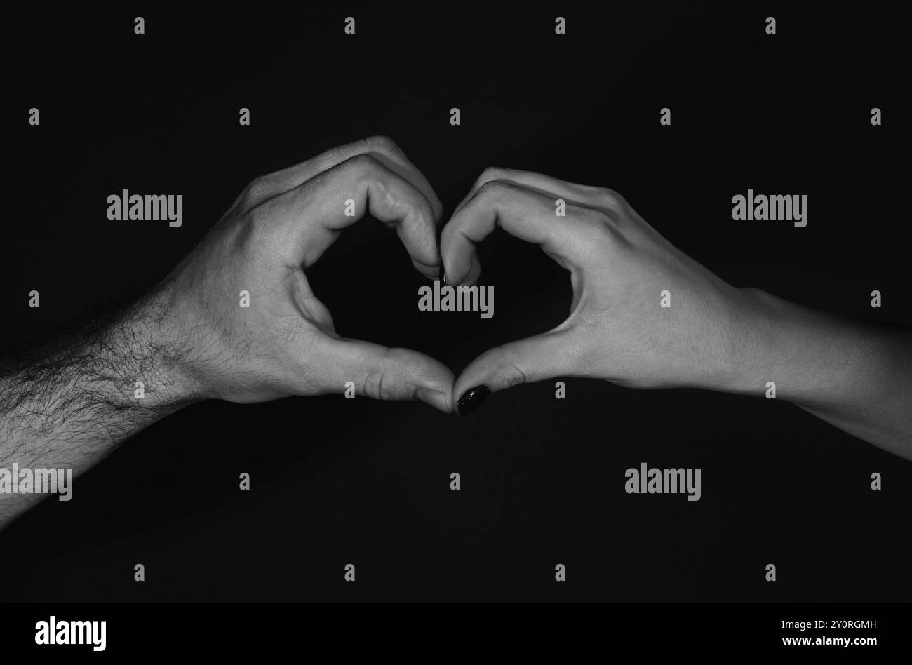 Female and male hands in form of heart. Hands in shape of love hearts ...