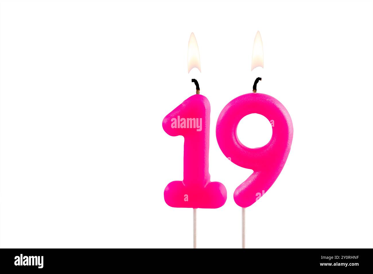 Pink number 19 birthday candle on white background Stock Photo - Alamy