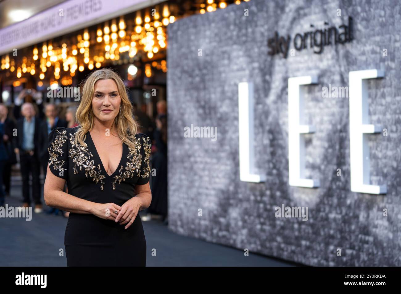 Kate Winslet poses for photographers upon arrival at the UK premiere ...