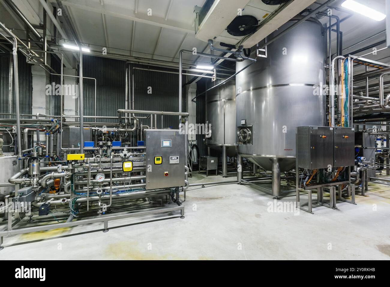 Modern brewery production line. Filtration equipment and pump machinery ...