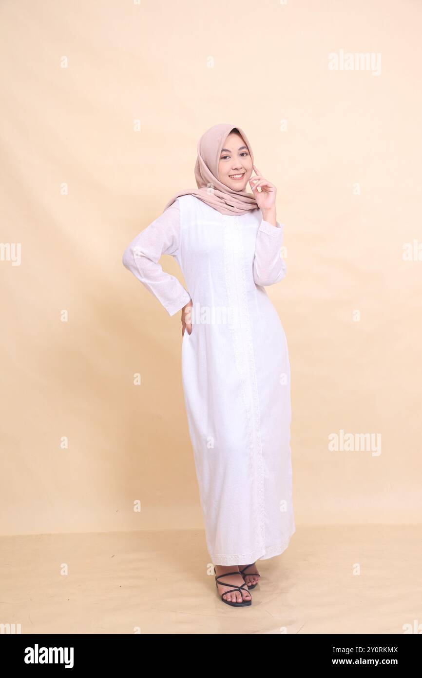 woman asian wearing beautiful dress smiling pose holding waist and ...