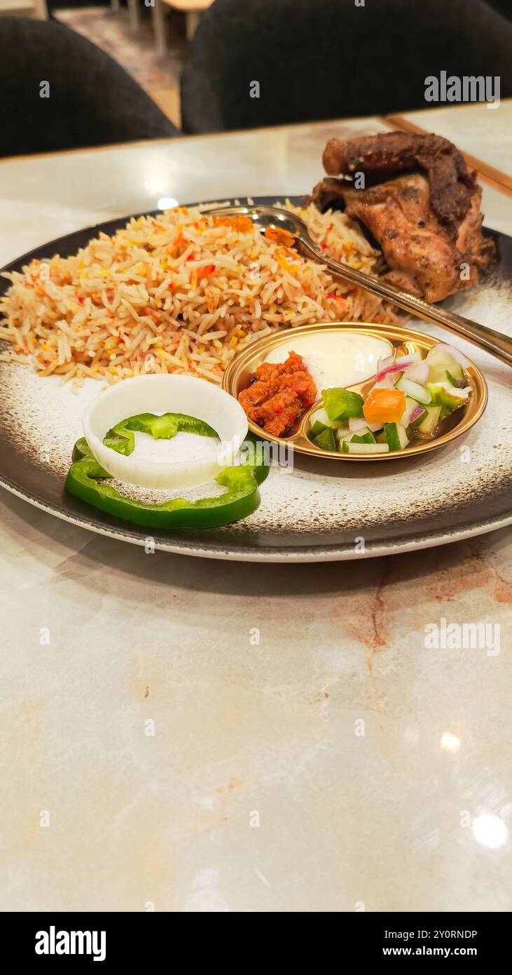 semi-closeup portrait of kebuli rice (nasi kebuli), typical Arabic food ...