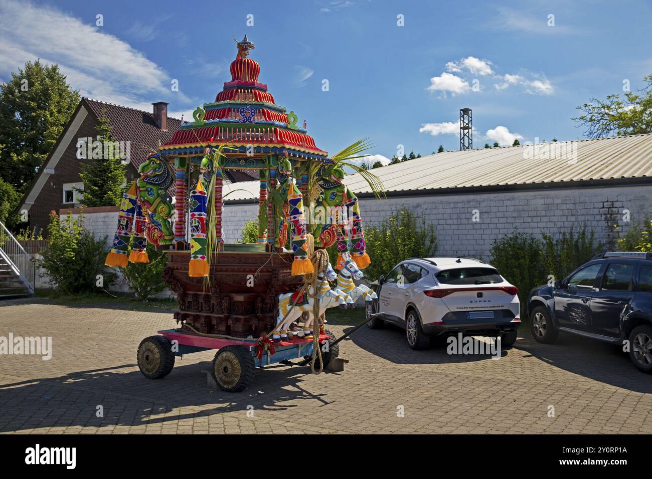 Car from the temple festival in the car park of the Hindu temple Sri ...