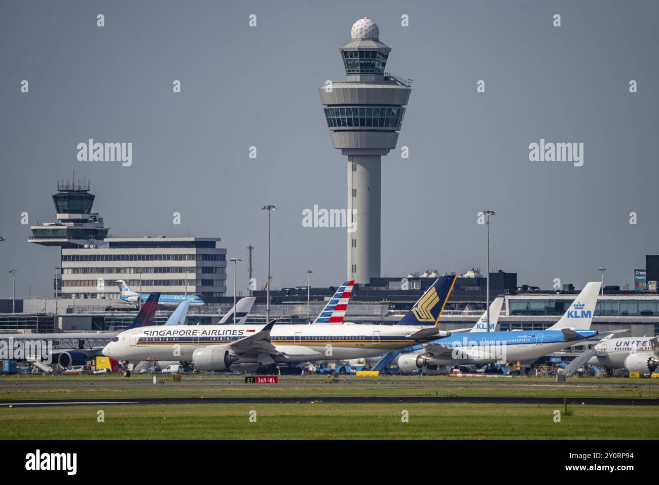 Aircraft at Amsterdam Schiphol Airport, taxiway, apron, air traffic ...