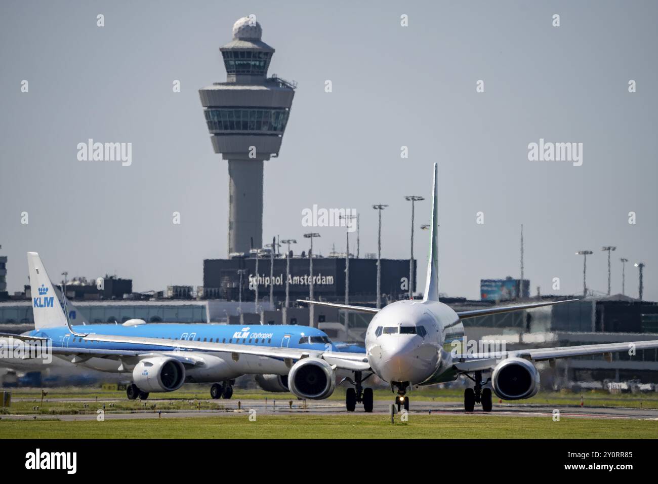 Aircraft at Amsterdam Schiphol Airport, on the taxiway for take-off on ...