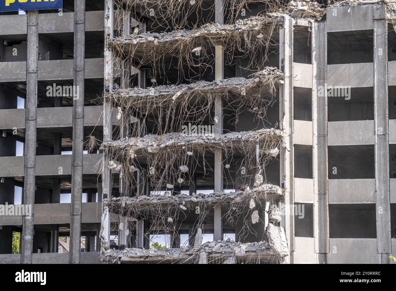 Demolition of a former office building, after complete gutting only the ...