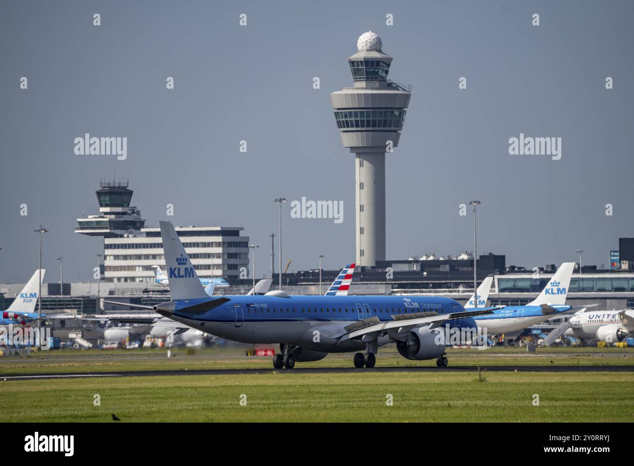 KLM Embraer E195-E2, aircraft landing at Amsterdam Schiphol Airport ...