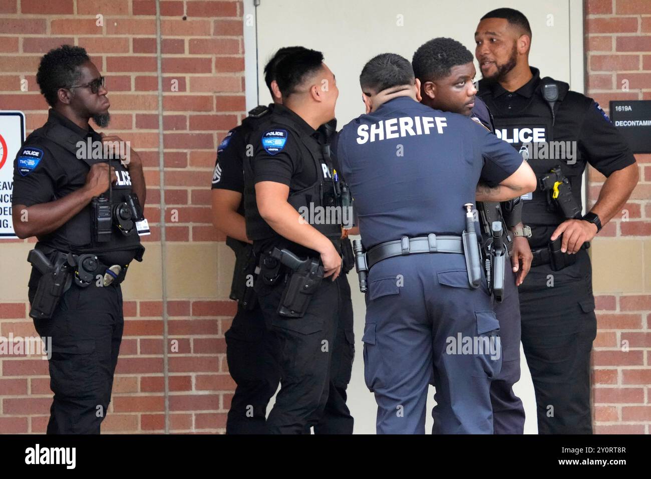 Law enforcement offices stand outside Ben Taub Hospital after a Harris ...