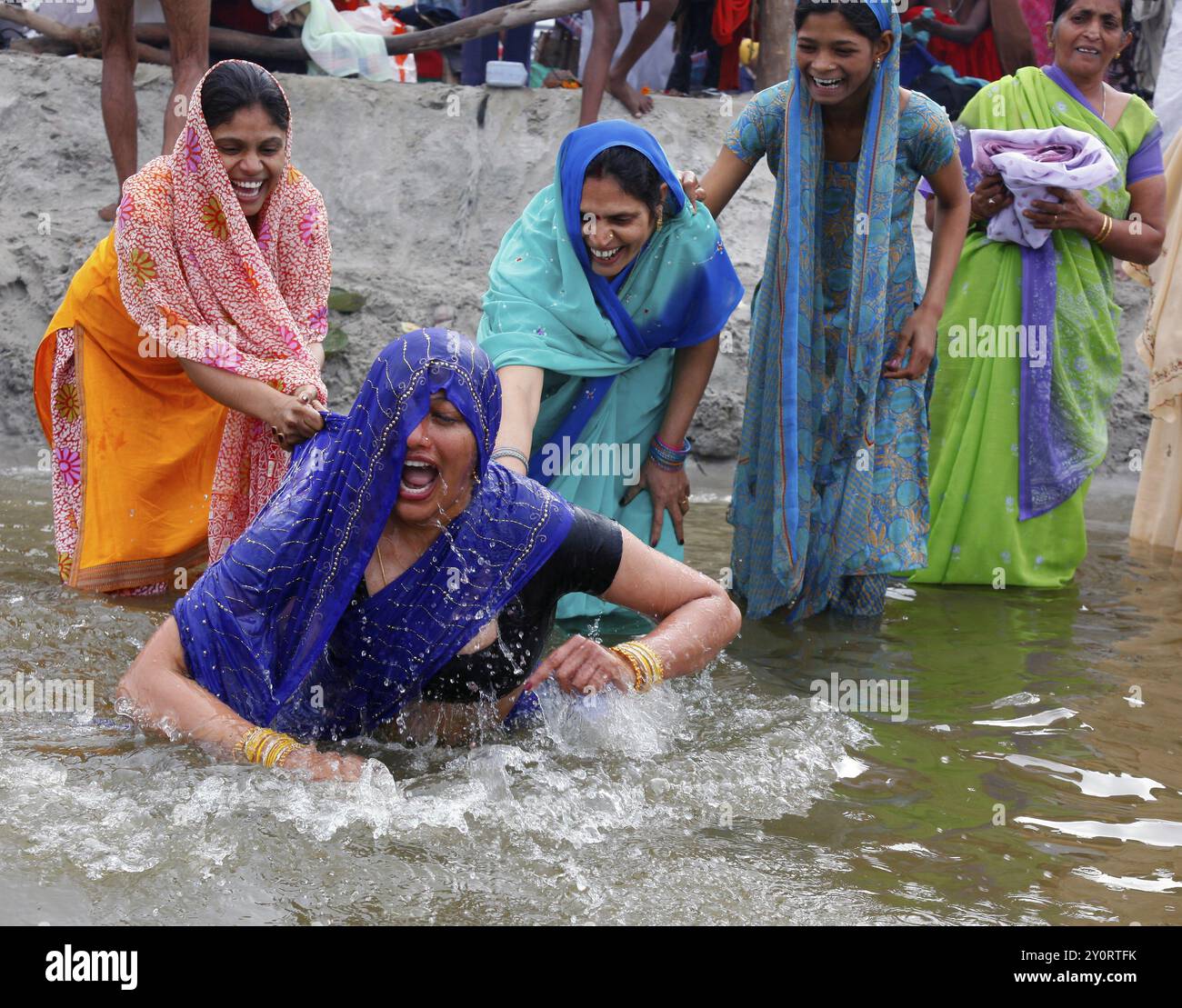 Indian woman taking bath india hi-res stock photography and images - Alamy