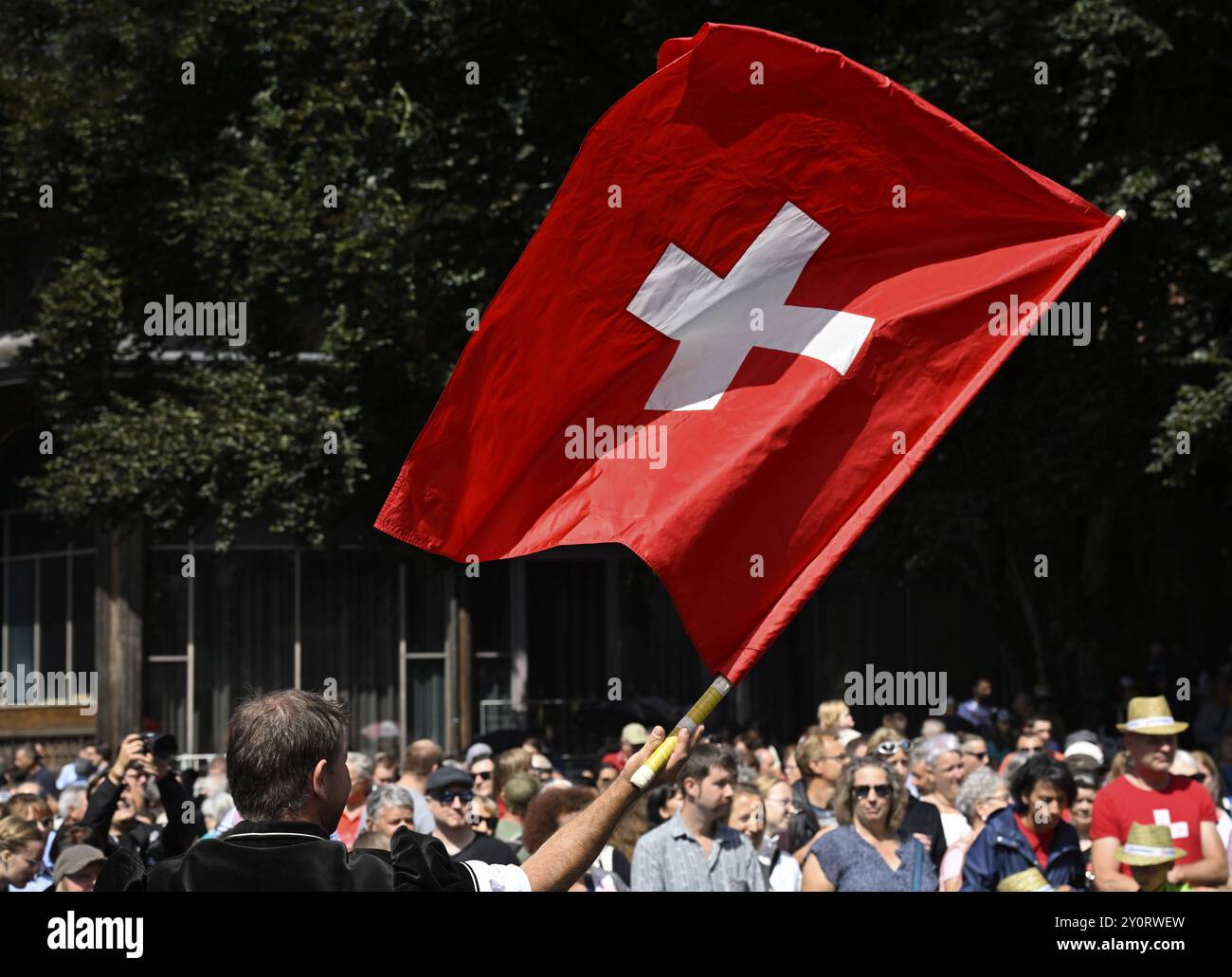 Flag waving Swiss flag Stock Photo - Alamy