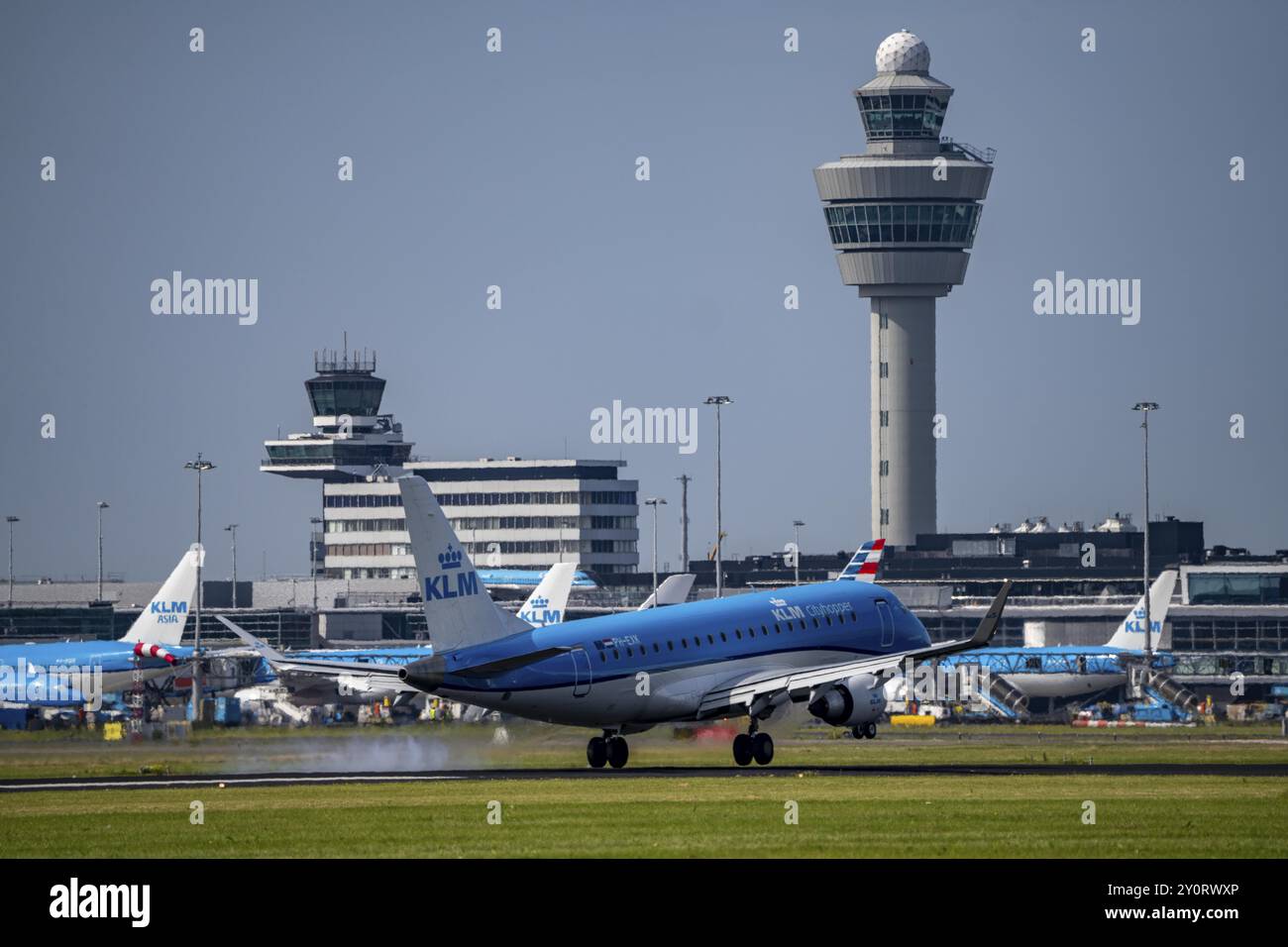 KLM Embraer E175 aircraft landing at Amsterdam Schiphol Airport ...