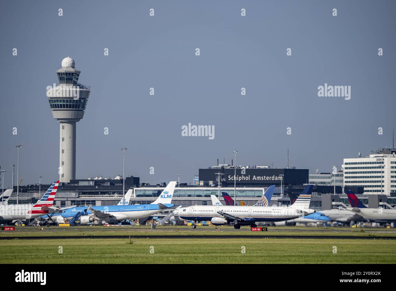 Aircraft at Amsterdam Schiphol Airport, taxiway, apron, air traffic ...