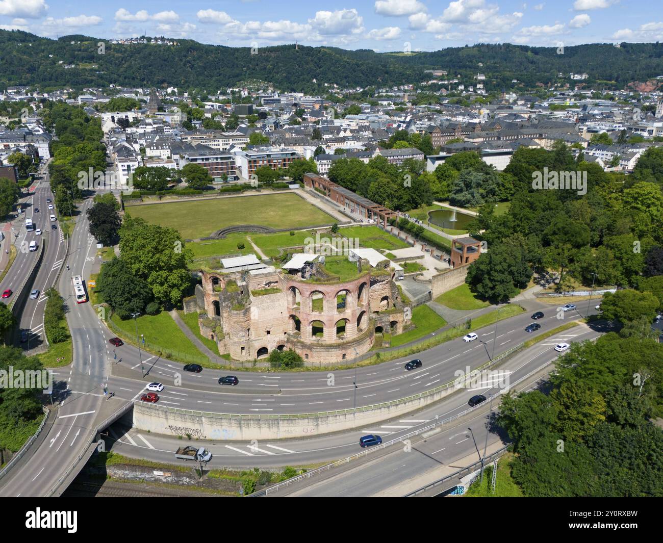 Aerial view of historical ruins in a city with neighbouring street ...