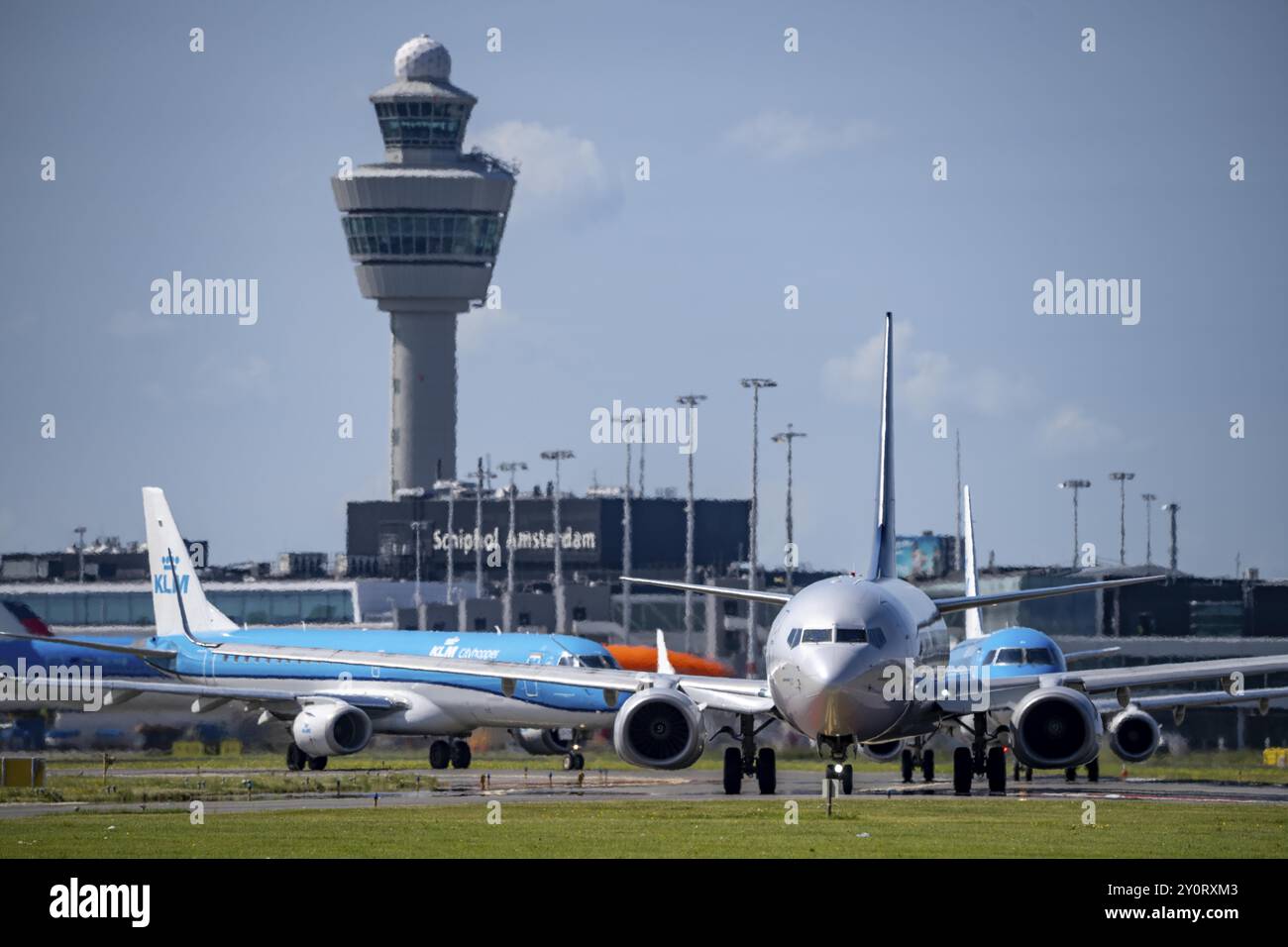 Aircraft at Amsterdam Schiphol Airport, on the taxiway for take-off on ...