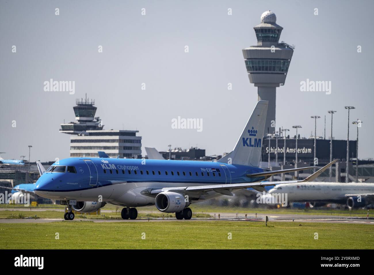 Aircraft at Amsterdam Schiphol Airport, on the taxiway for take-off on ...