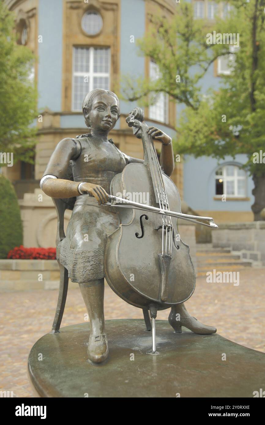 Cello player in blue hi-res stock photography and images - Alamy