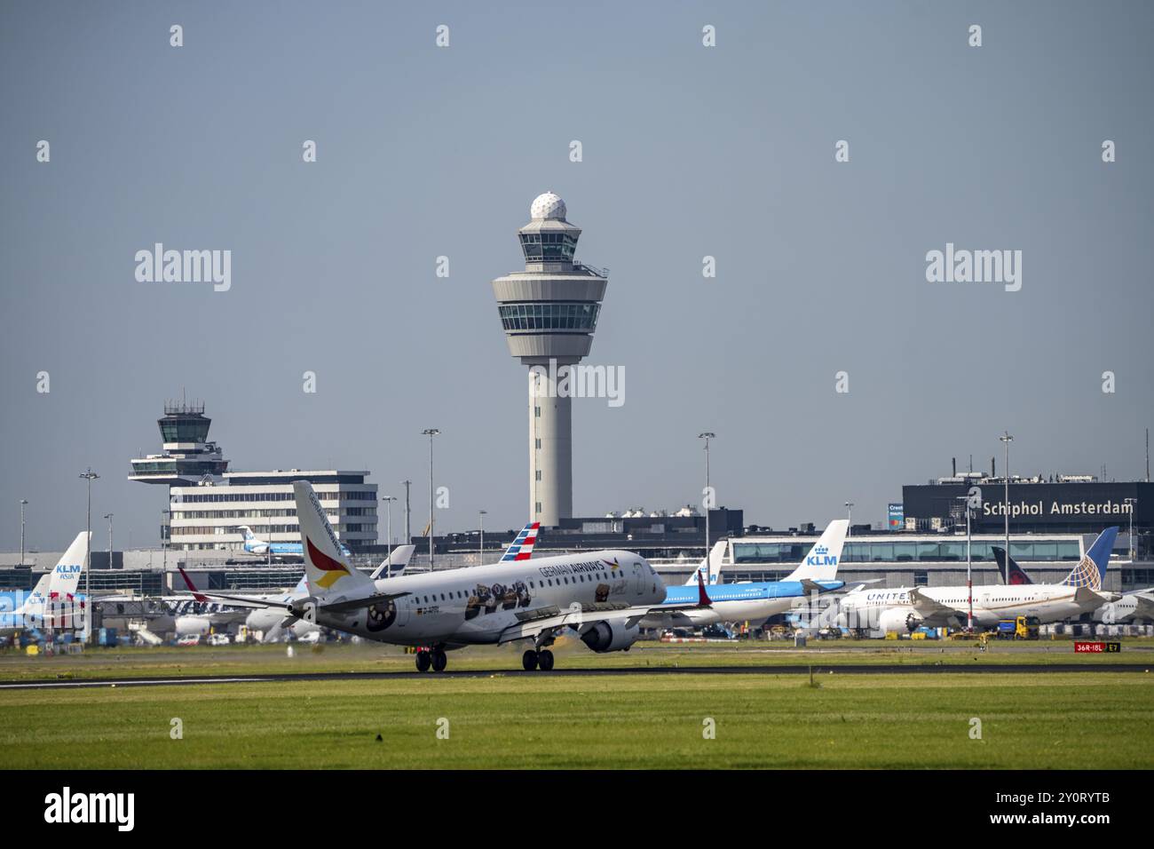 German Airways Embraer E190SR, aircraft landing at Amsterdam Schiphol ...
