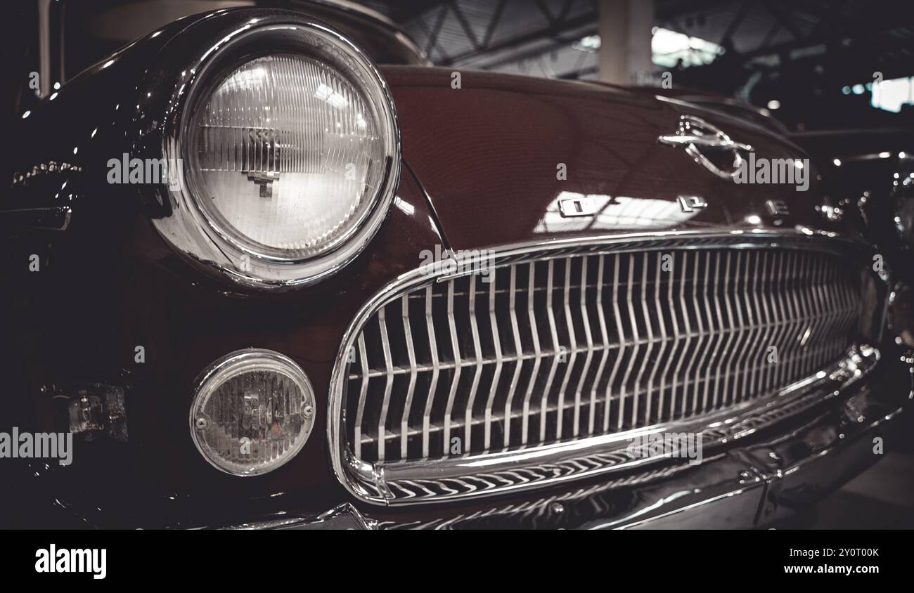 Opel Hood and Grille with Classic Logo on Maroon Car. High quality A ...