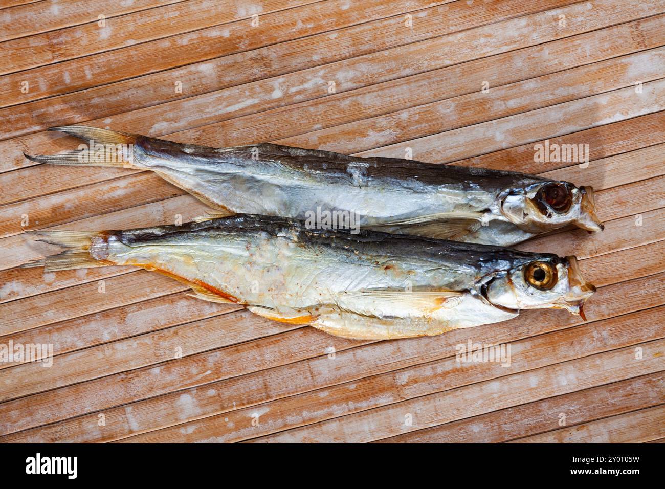 Image of air-dried salted sabrefish on wooden background Stock Photo ...