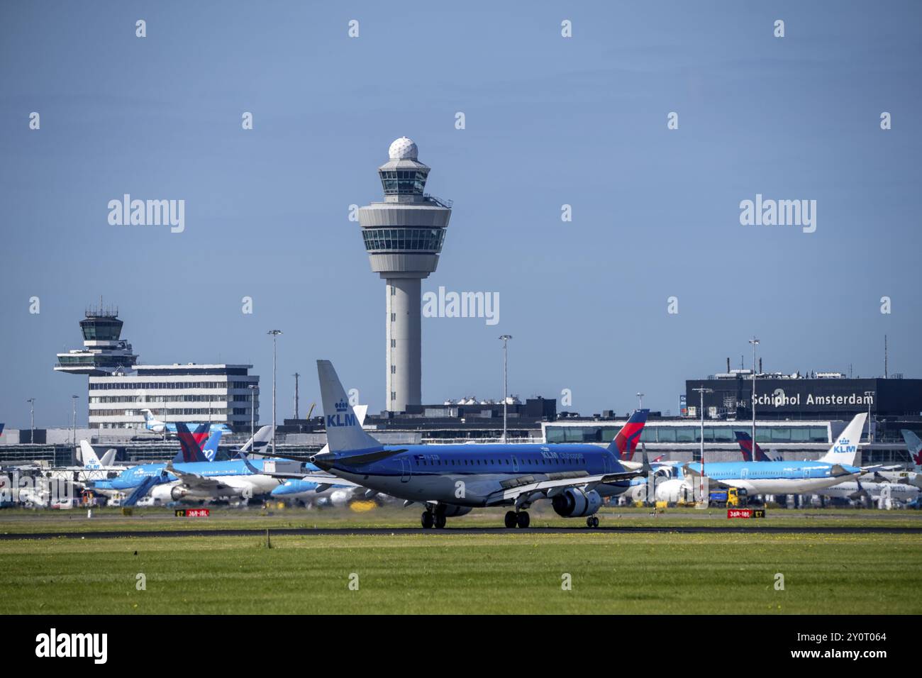 KLM Embraer E190STD aircraft landing at Amsterdam Schiphol Airport ...