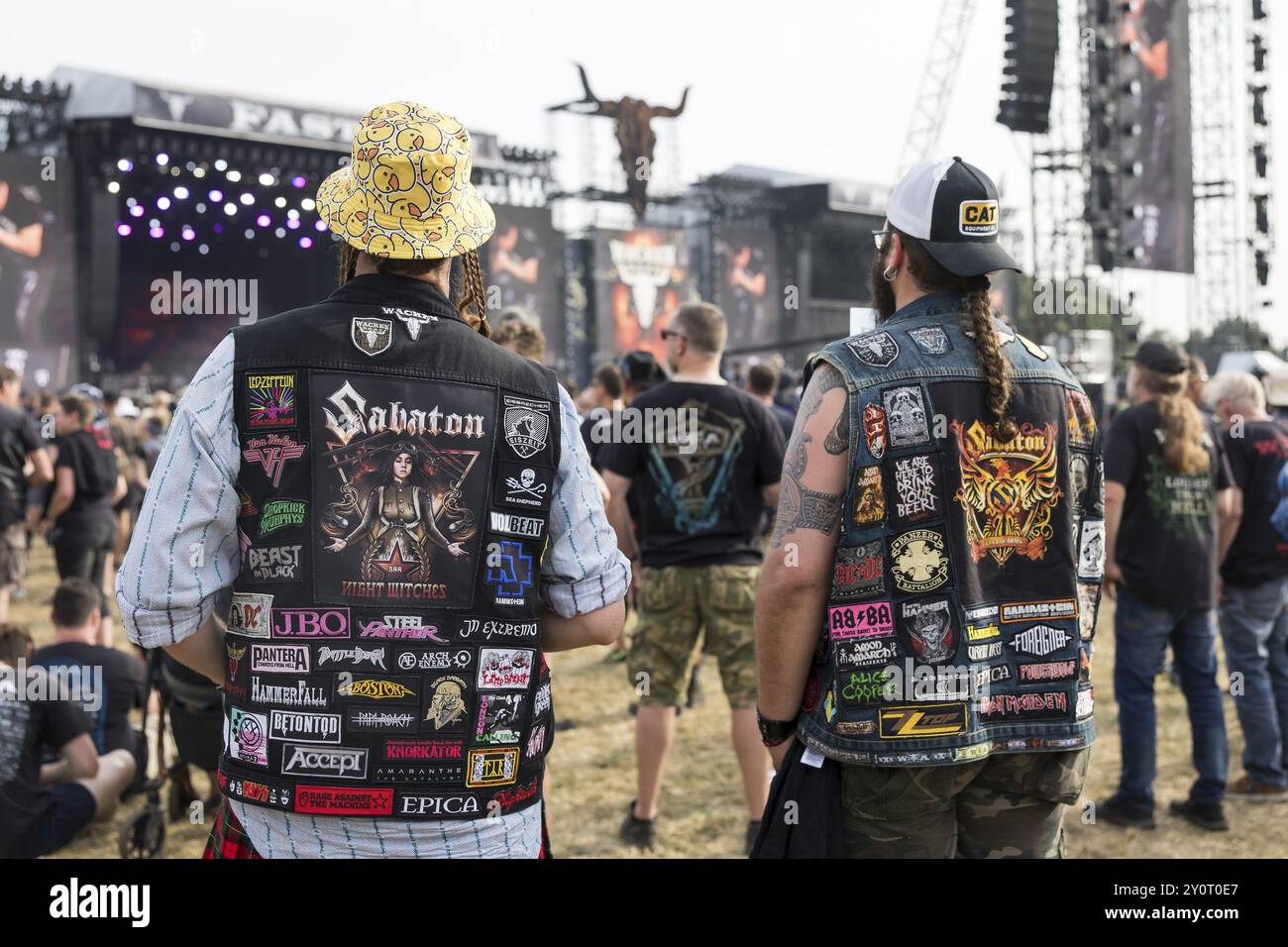 Metalheads with patches in front of the main stages at the Wacken Open ...