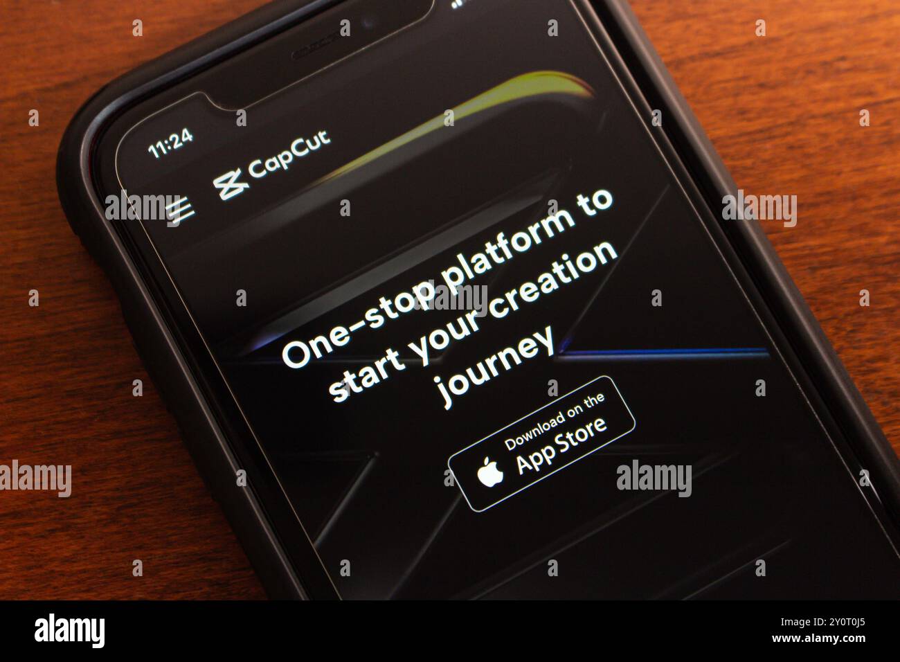 The CapCut website is displayed on an iPhone screen. CapCut is a ... The CapCut website is displayed on an iPhone screen. CapCut is a ...