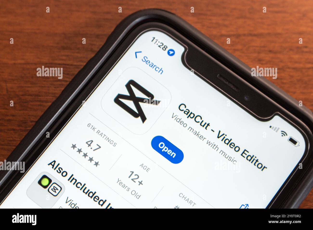 The CapCut app in the App Store is displayed on an iPhone screen ...