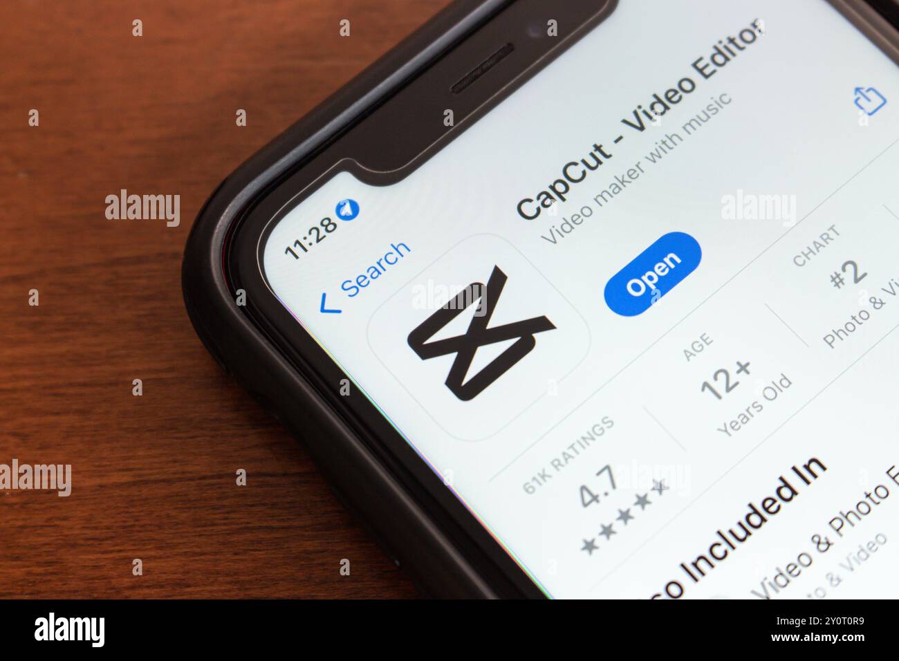 The CapCut app in the App Store is displayed on an iPhone screen ...