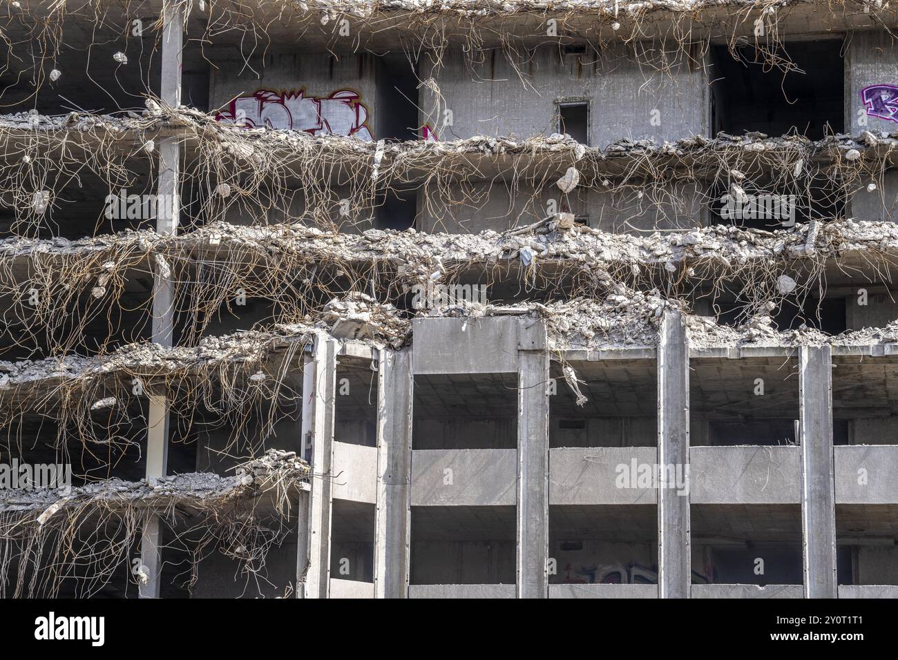 Demolition of a former office building, after complete gutting only the ...