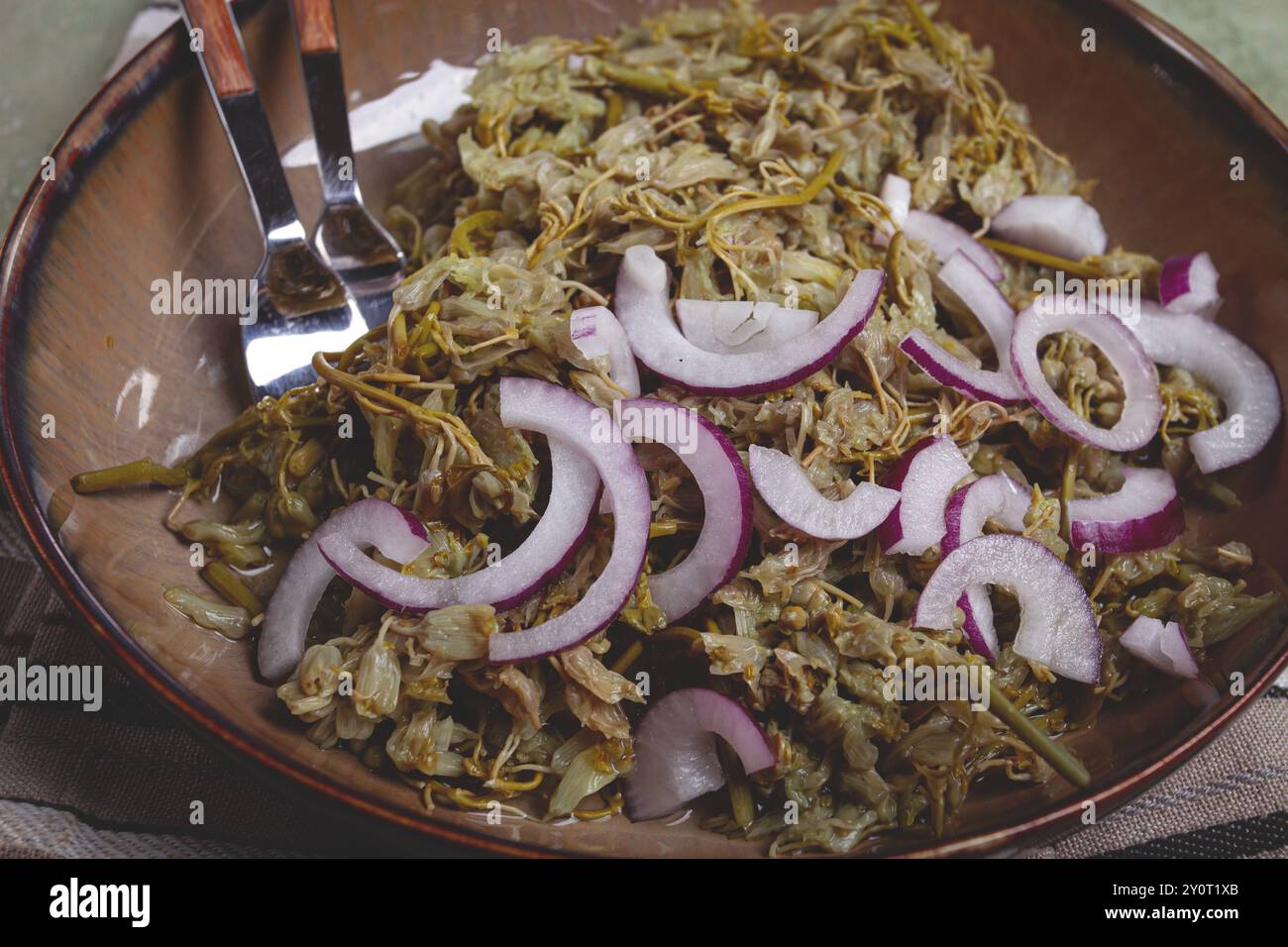 Jonjoli, Colchian klekachka, jonjoli salad, with red onion and butter ...