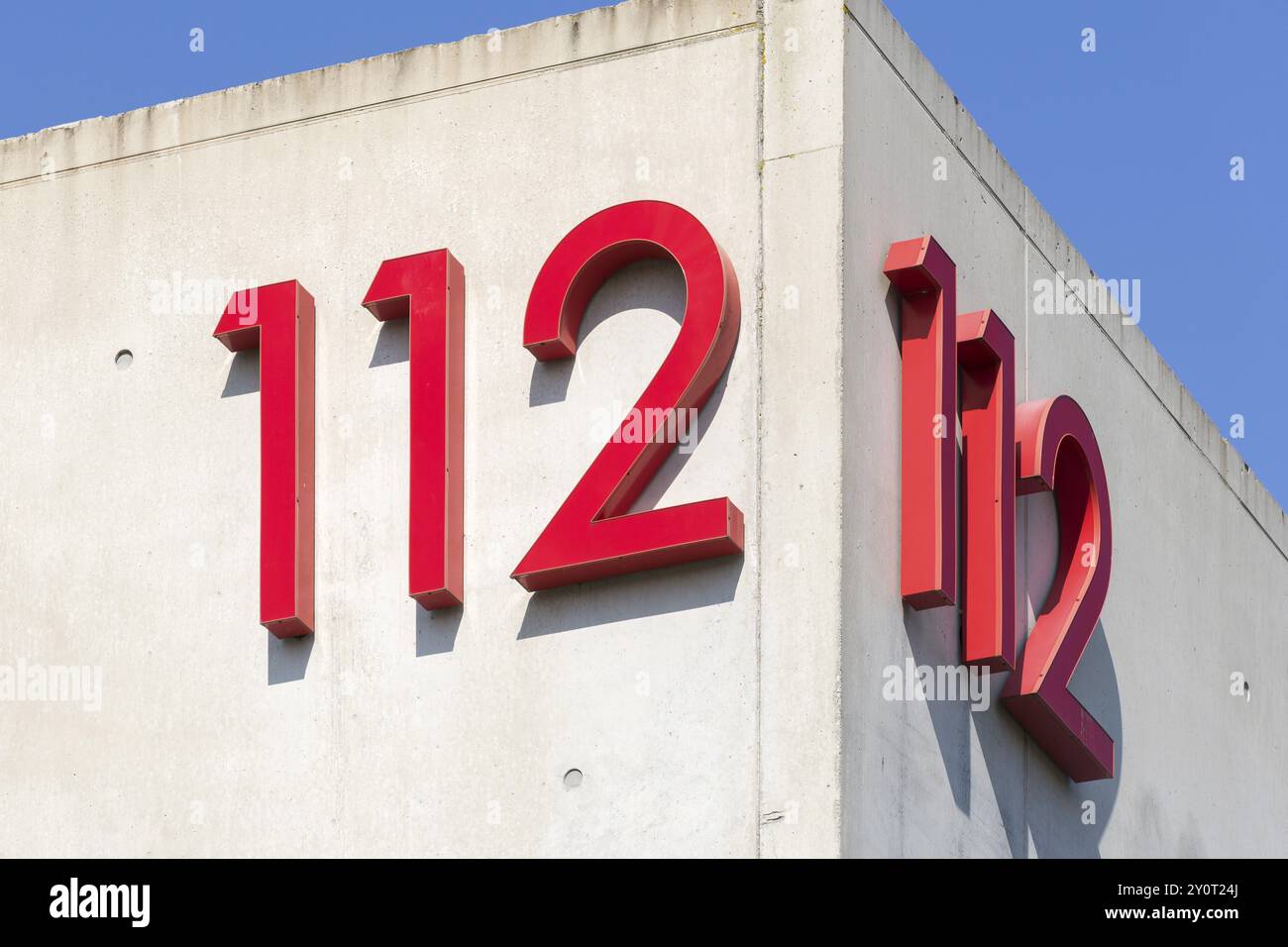 Symbolic image, emergency number 112 on a building, facade, emergency ...