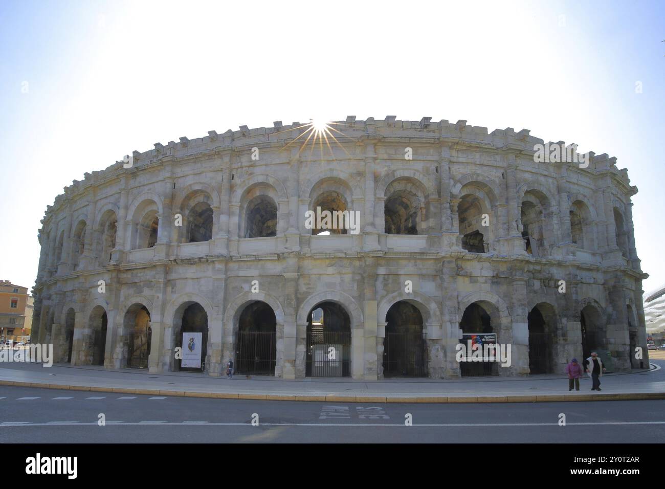 Roman amphitheatre and landmark backlit, Nimes, Gard, Provence, France ...