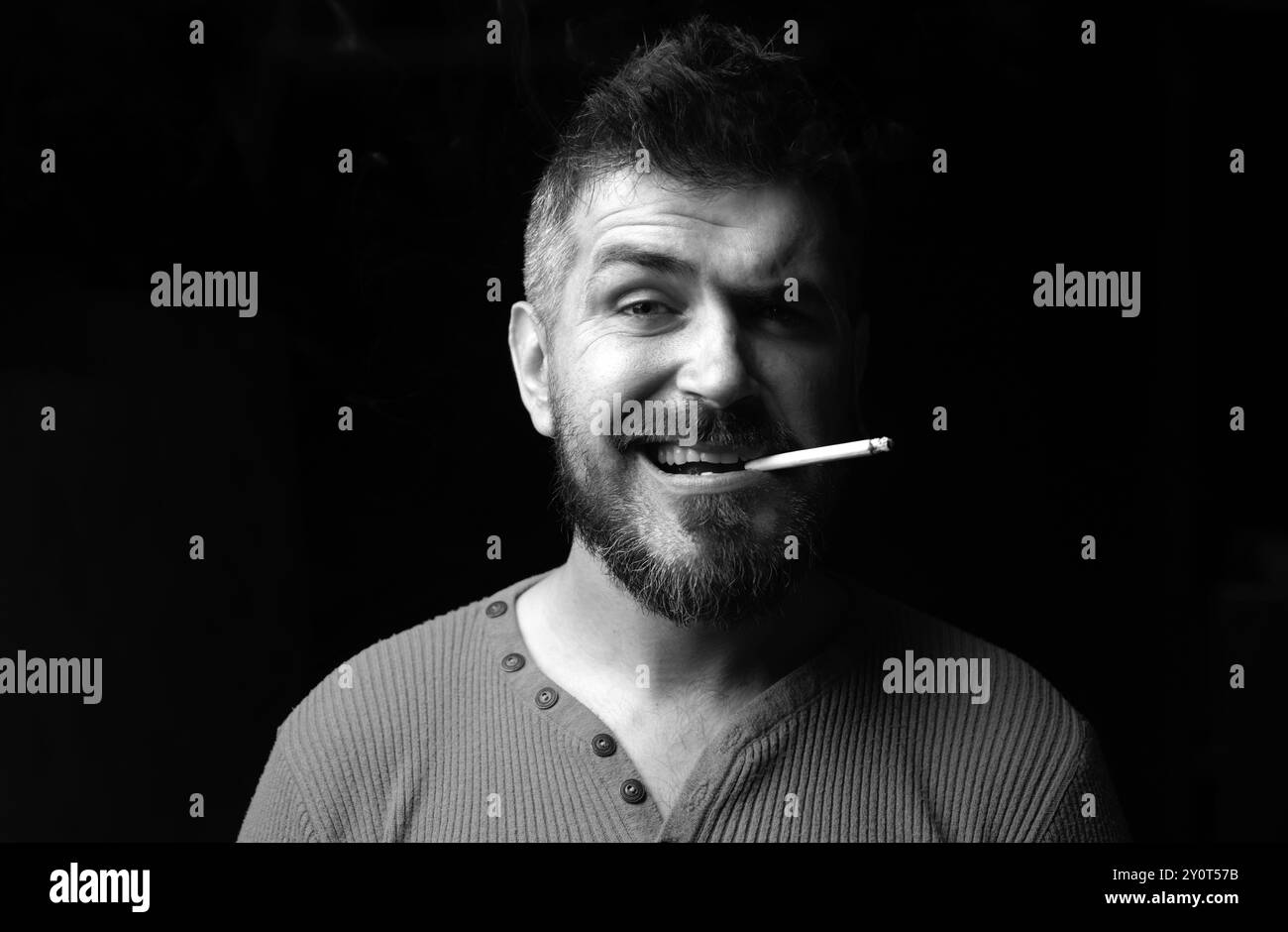 Bearded hipster man smoking cigarette. Man with bad harmful for his ...