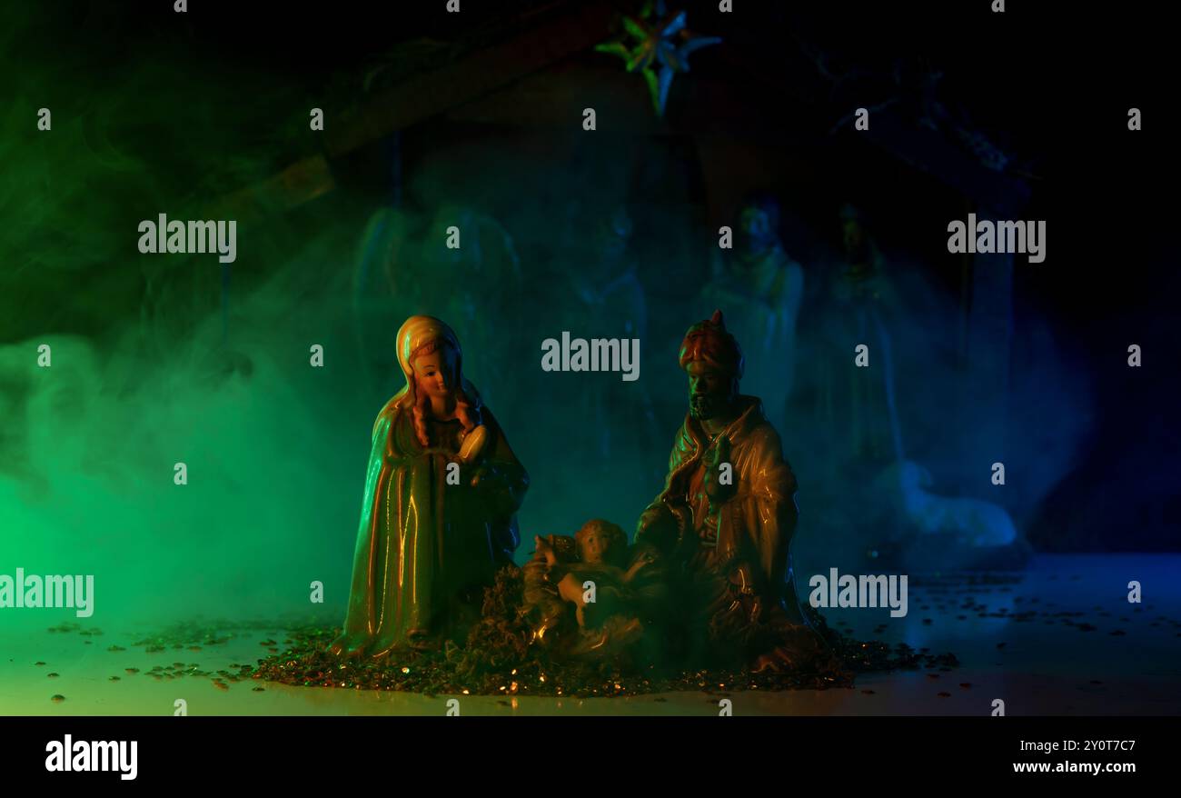 Christmas manger scene with figurines including Jesus, Mary, Joseph ...