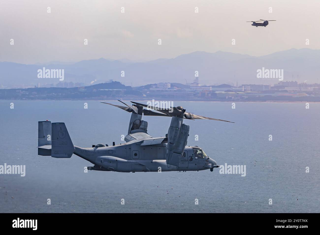 A U.S. Marine Corps MV-22B Osprey attached to Marine Medium Tiltrotor ...
