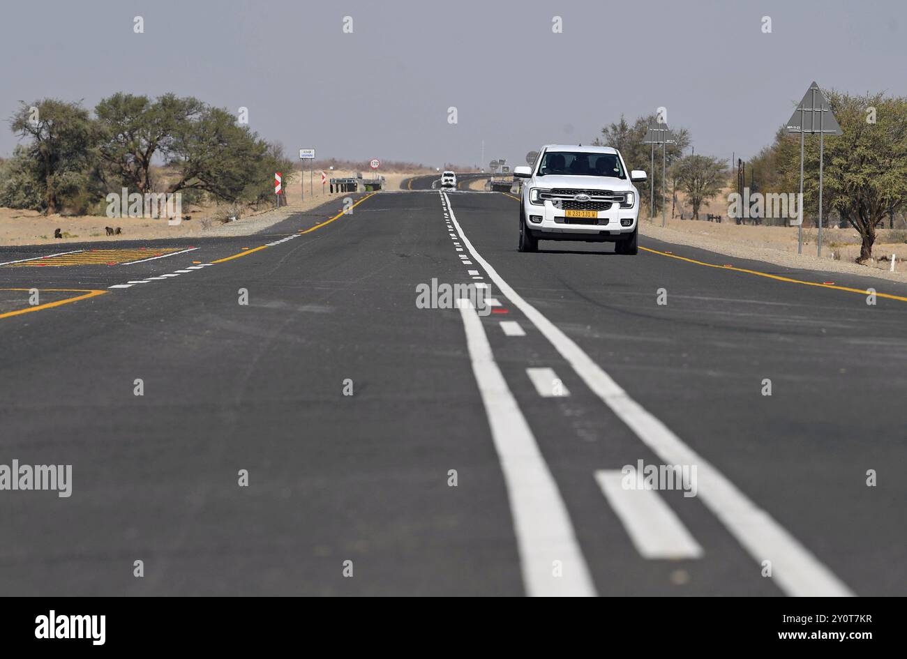 Windhoek, Namibia. 3rd Sep, 2024. Cars run on the reopened B1 highway ...