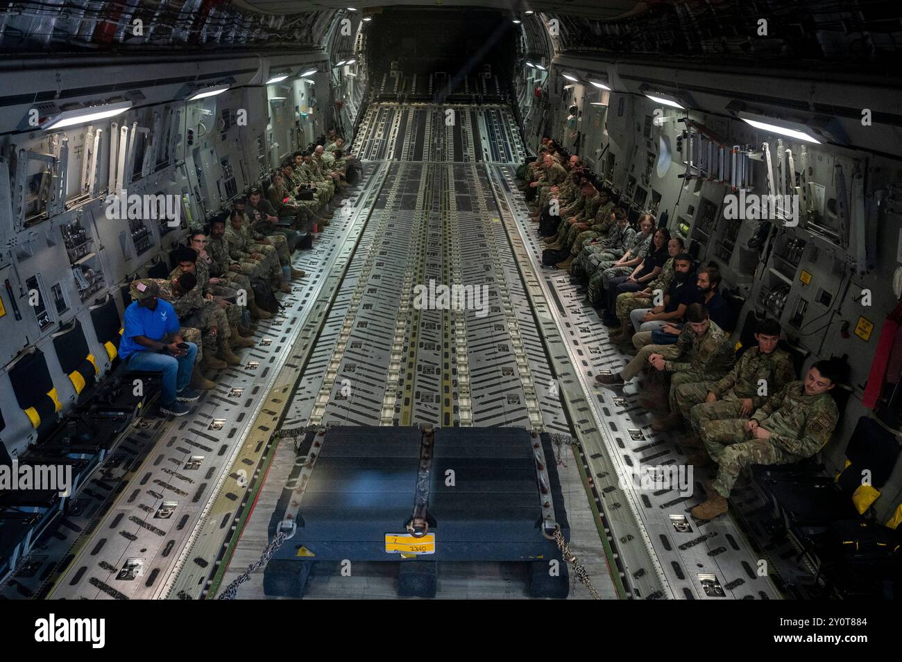 U.S. Airmen assigned to the 628th Air Base Wing and 1st Combat Camera ...