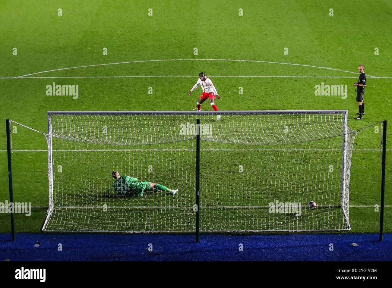 Reyes Cleary of Walsall scores his penalty during the penalty shootout ...